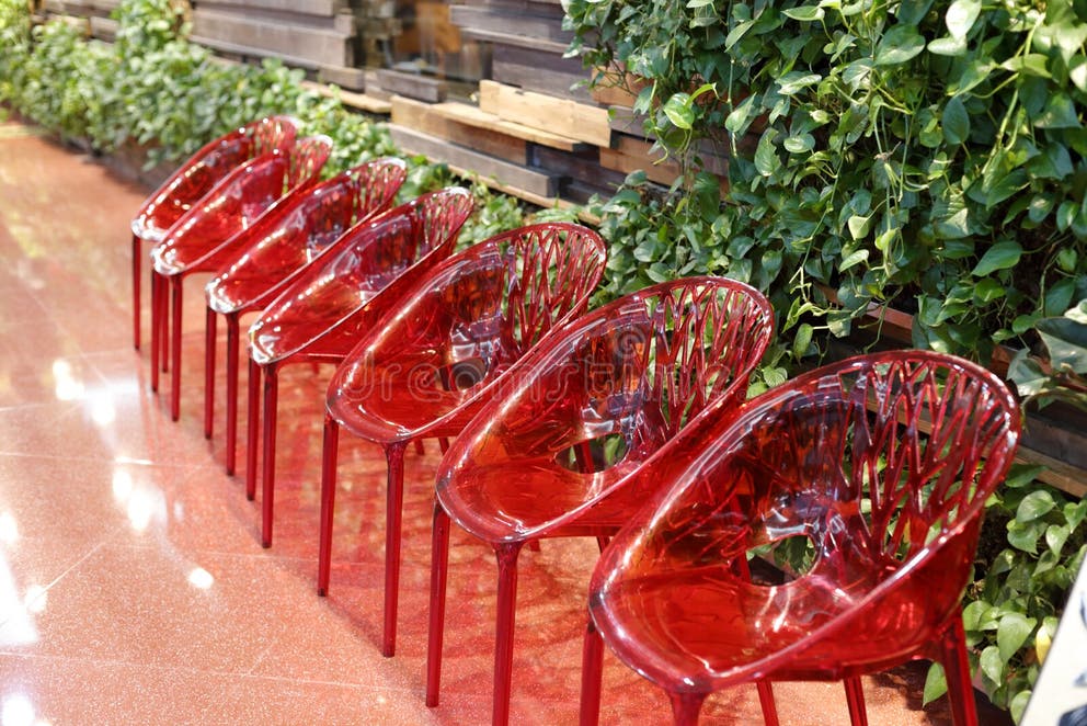 A Row of Red Plastic Chairs Stock Image - Image of tide, store: 59463581