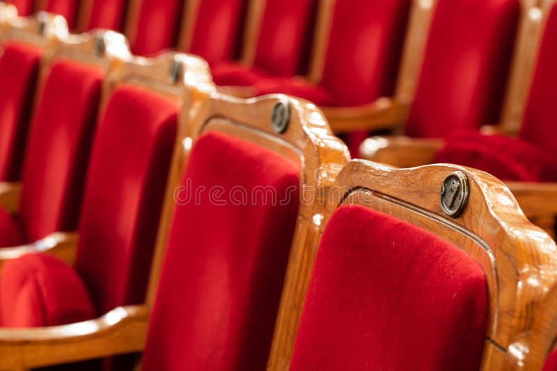 Row of red seats theatre stock photo. Image of film - 208502896
