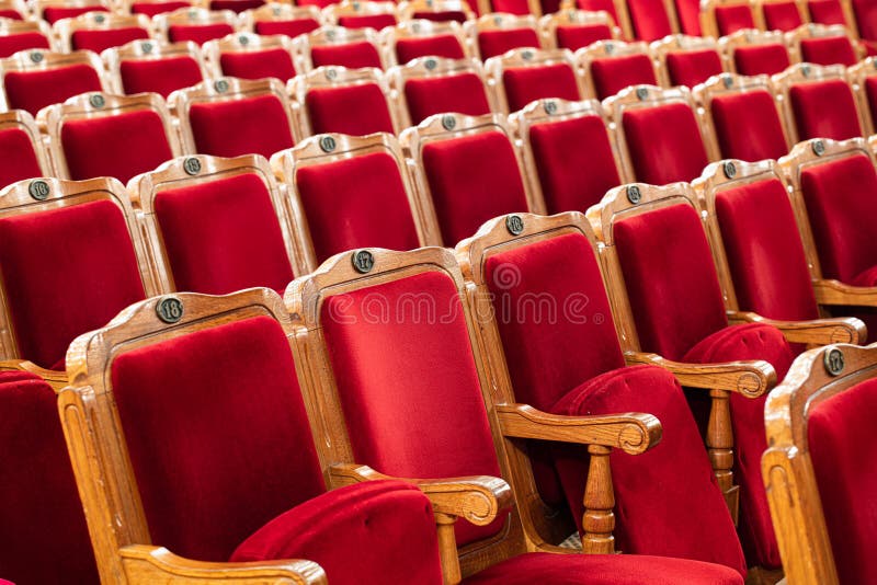 Row of red seats theatre stock image. Image of opera - 208503141