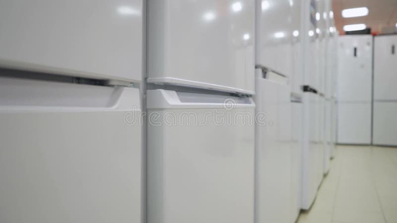 A Row of Refrigerators with Visible Handles Stock Footage - Video of ...