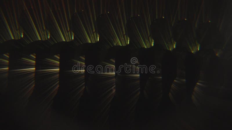 Abstract Silhouette Pattern with Golden Light Beams and Multiple ...