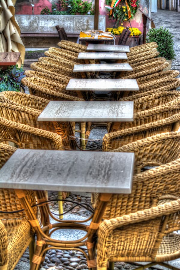 Row of Restaurant Tables in a Urban Square Stock Image - Image of table ...