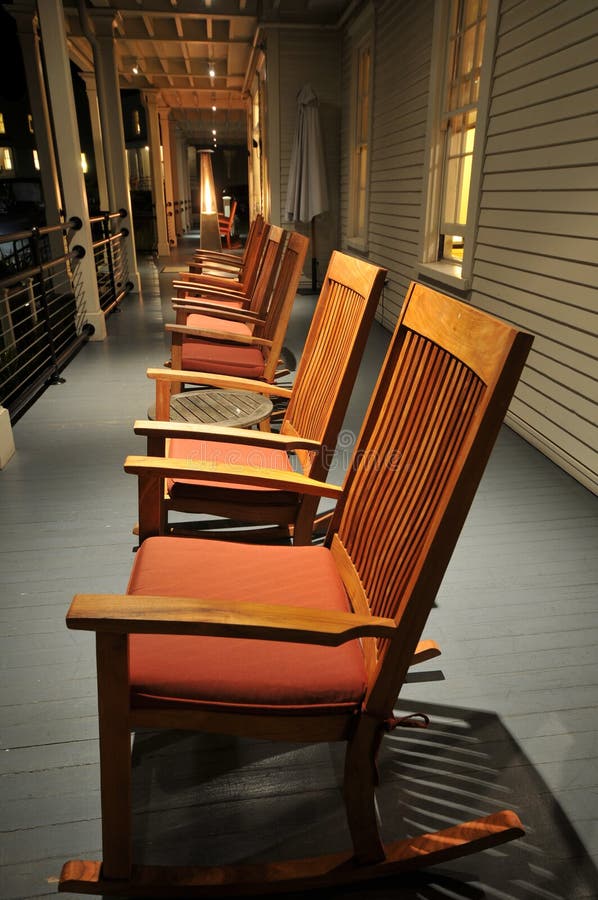 Row of Rocking Chairs on Porch Stock Photo - Image of building, chairs ...