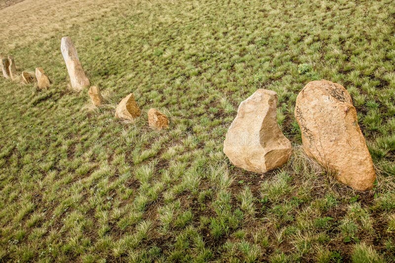 A Row of Rocks are on a Grassy Field in Arkaim Ural Russia Stock Image ...