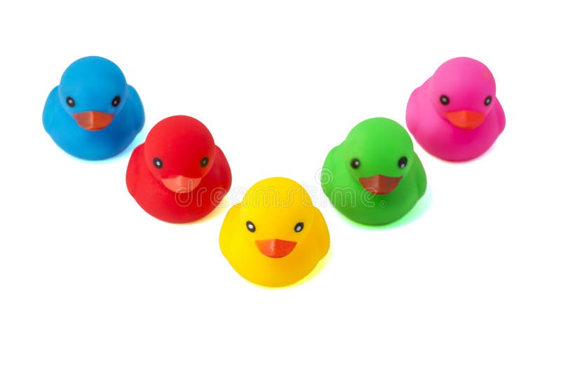 A Row of Rubber Ducks on a White Background. Bright Colored Rubber ...