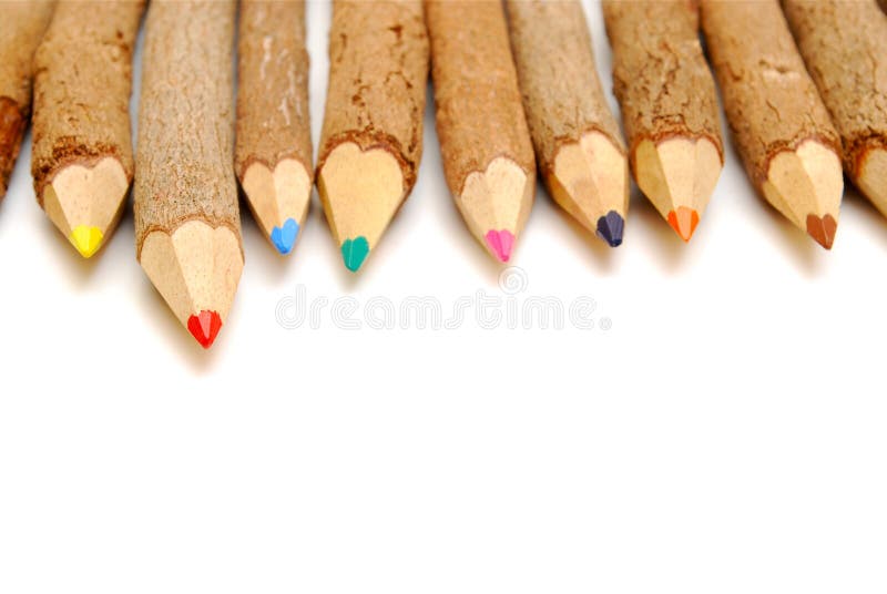 Three Color Pencils Made of a Natural Tree and Pine Cone Stock Image ...