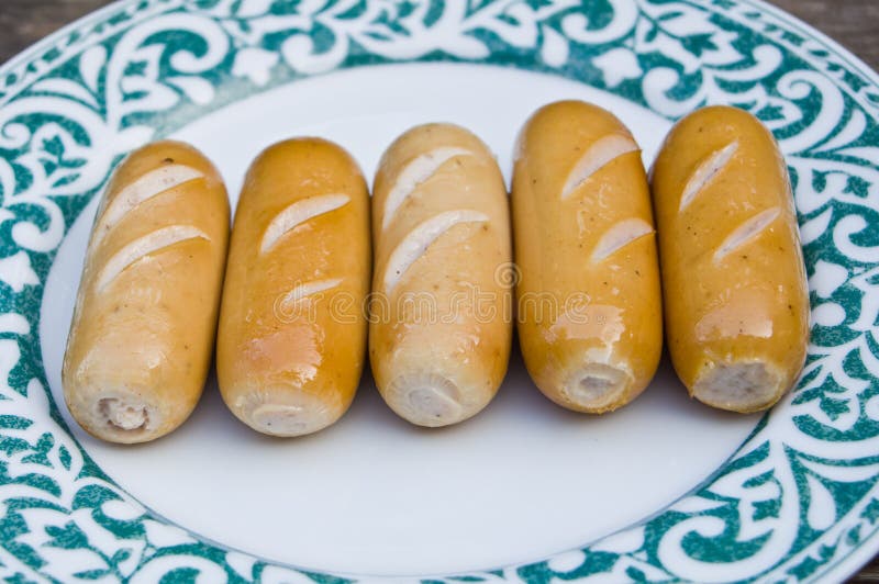 Row of sausages on plate stock photo. Image of barbeque - 22811884