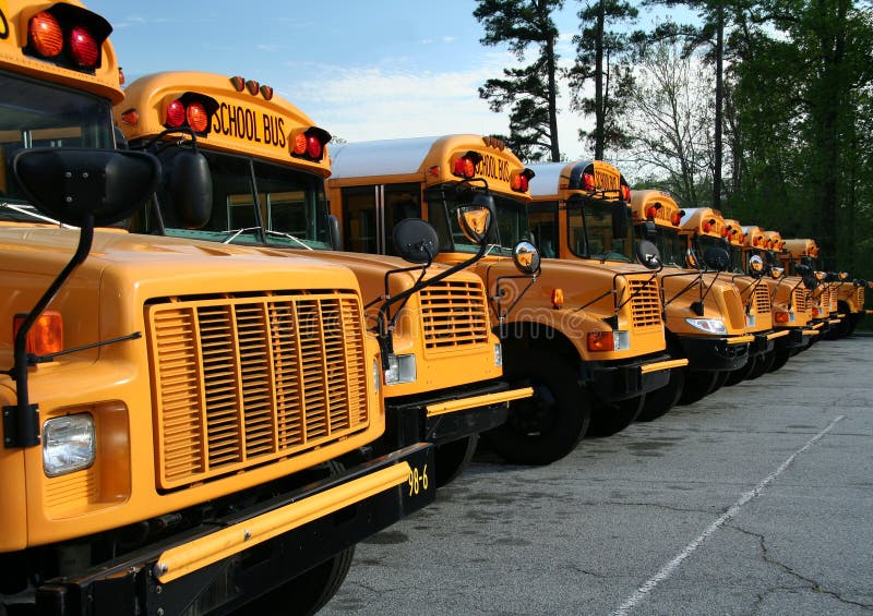Row of school buses stock image. Image of institution - 3544071