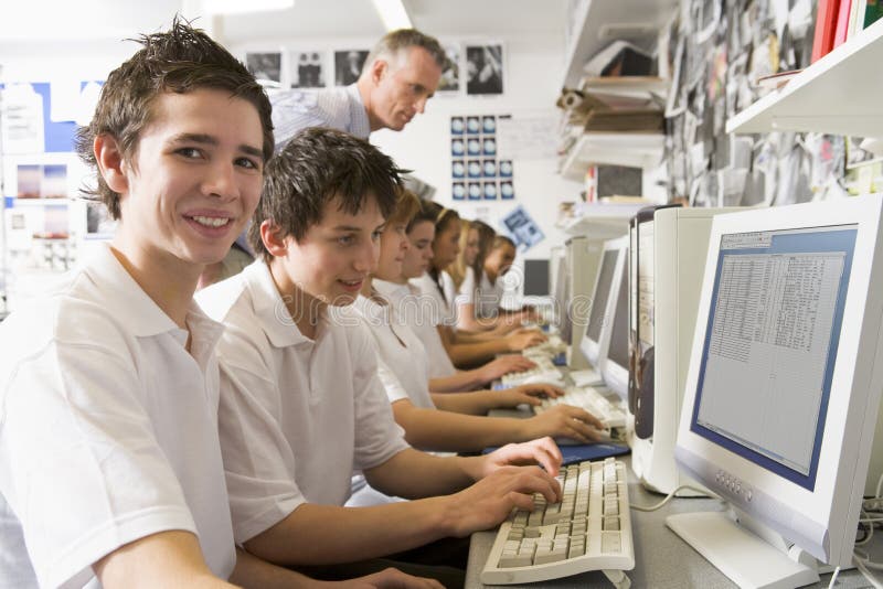 Row of Schoolchildren Studying in on Computers Stock Image - Image of ...