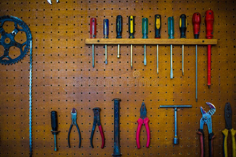 Tools on peg board stock image. Image of spike, home - 239320669