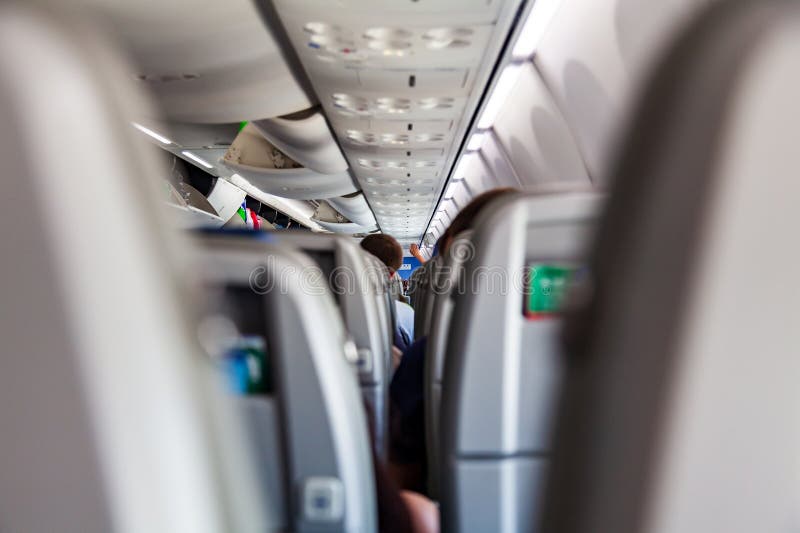 A Row of Seats for Passengers in an Airplane in Perspective Stock Photo ...
