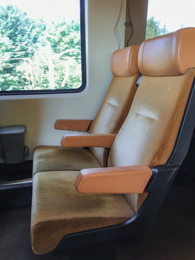Row of seats on a train stock image. Image of cabin - 258904085