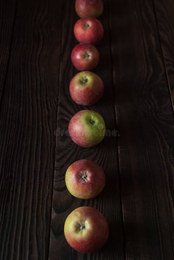 Row of Several Apples on a Wooden Surface Stock Photo - Image of ...