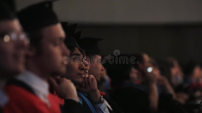 Row of Sitting in Assembly Hall Multicultural Graduating Students Stock ...