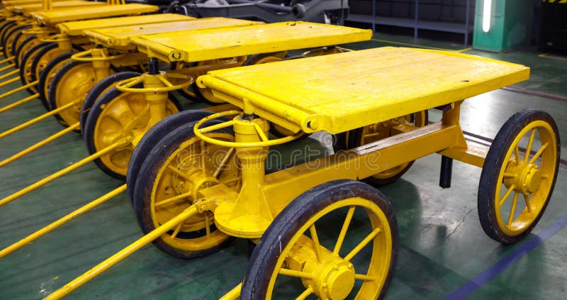A Row of Small Platforms on Four Wheels for Delivery Stock Photo ...