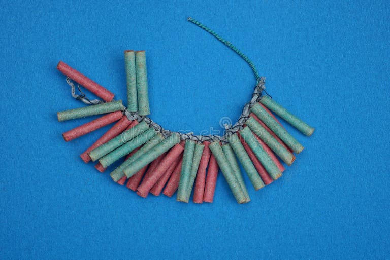 A Row of Small Red Green Firecrackers Stock Photo - Image of explosive ...