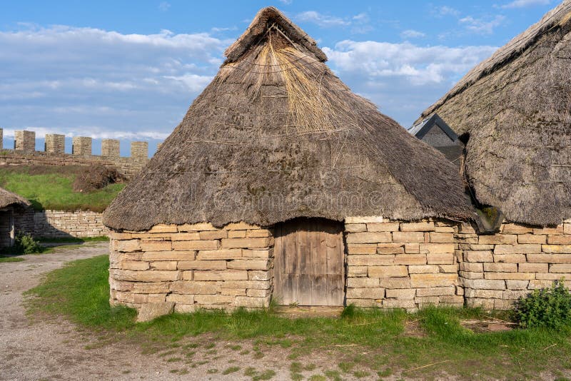 Row of Small Thatched Huts Along a Path Outside a Rural Settlement ...