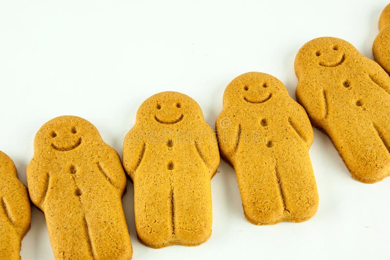 Row of Smiling Gingerbread Men Stock Photo - Image of bread, goods ...