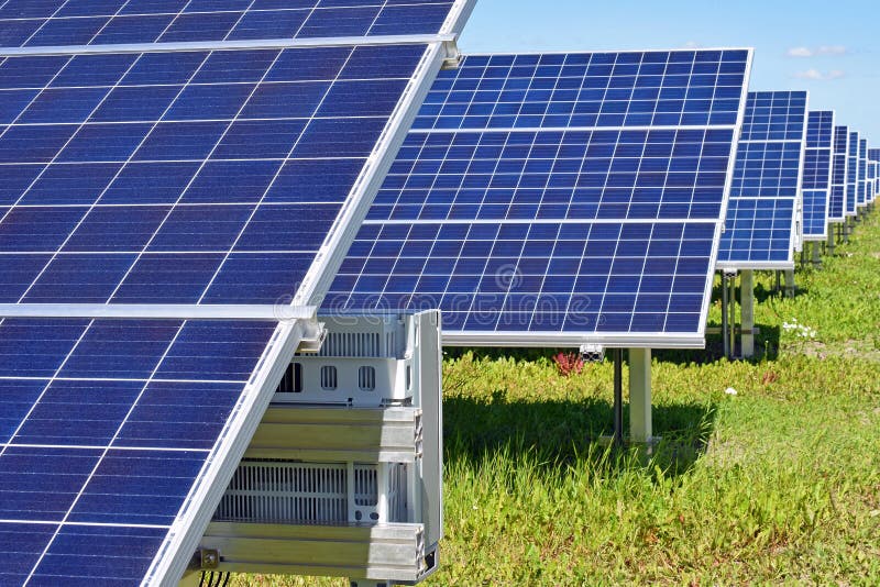 Row of solar energy panels stock photo. Image of issues - 96253058