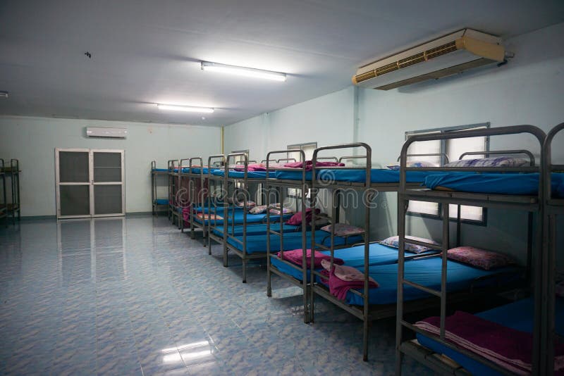 A row soldier bunk beds. stock photo. Image of dormitory - 93857398