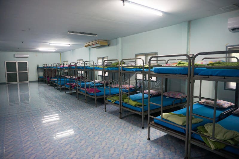 A row soldier bunk beds. stock photo. Image of architecture - 93857416