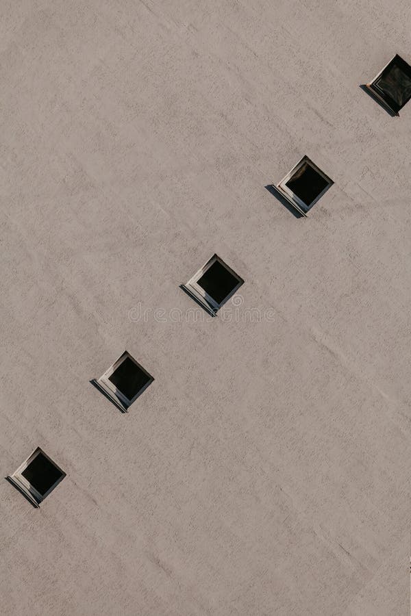 Row of Square Windows on Gray Wall Stock Image - Image of correct ...