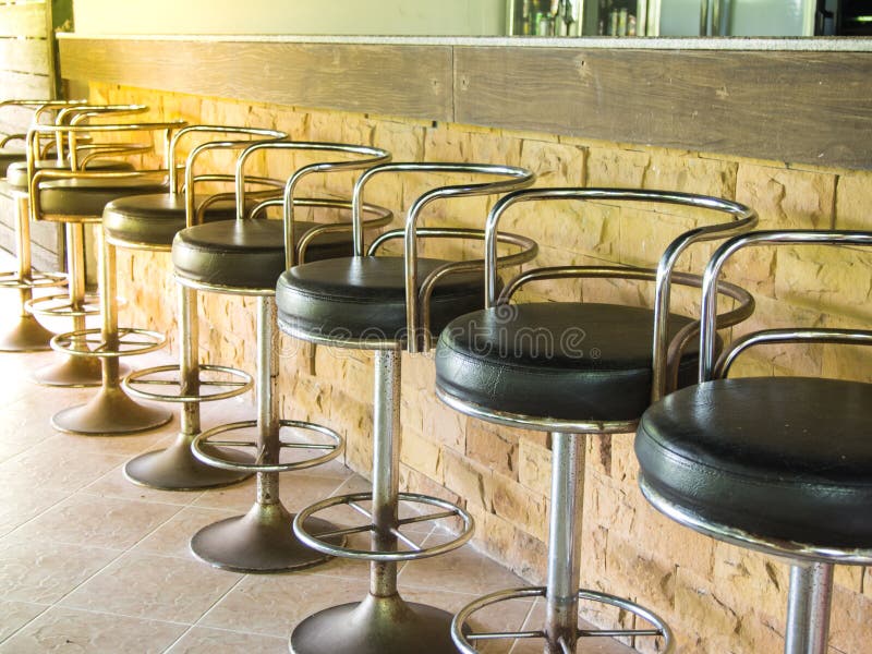 Row of Stool Chairs in Front of the Counter in the Restaurant Stock ...