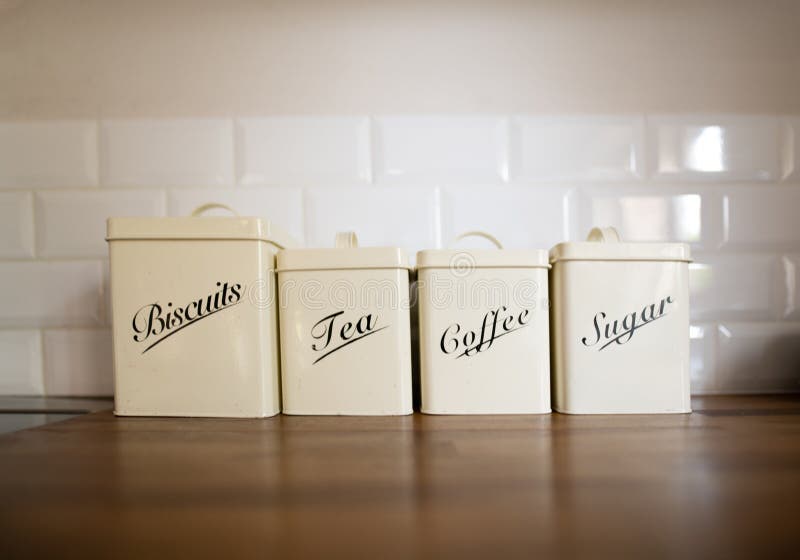 Row of storage tins stock image. Image of worktop, kitchenware - 194887679