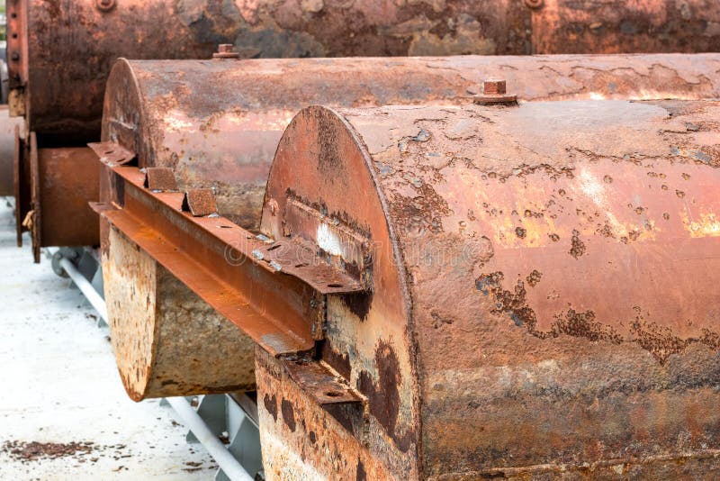 A Row of Stored Rustic Water Cylinders or Tanks Close Up Shot Stock ...