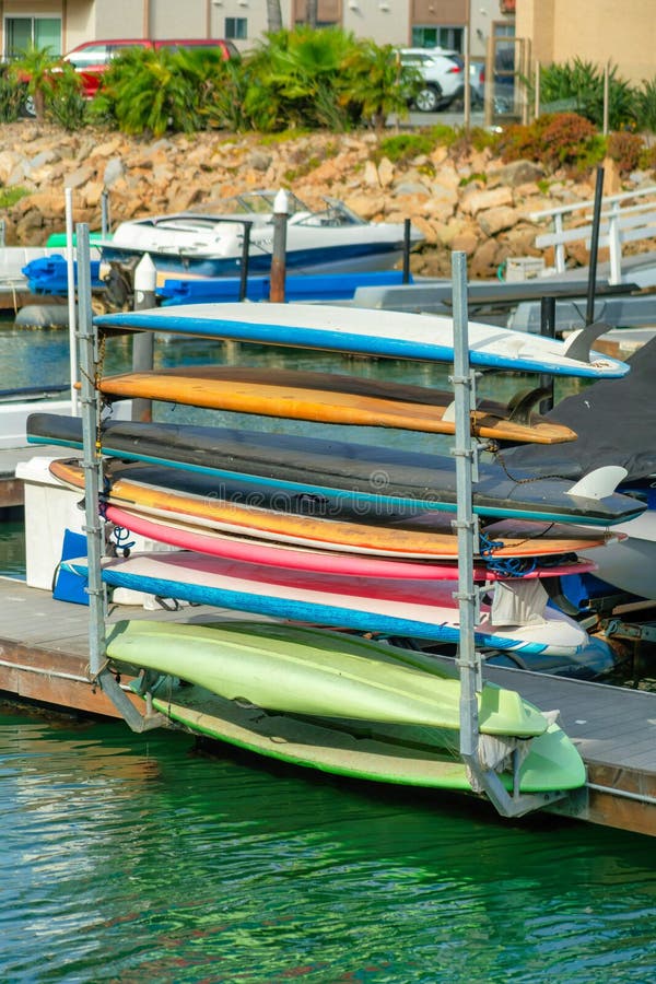 Row of Surfboard on a Metal Rack Stock Photo - Image of colorful ...