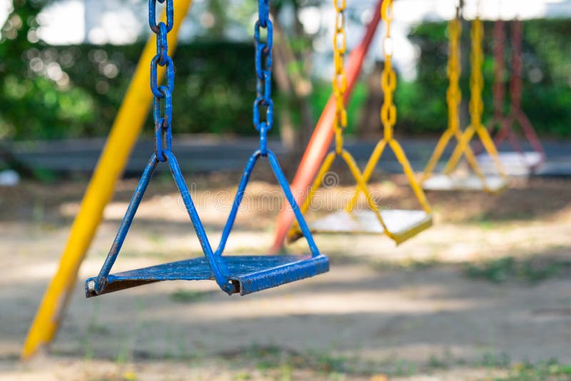 Row of swing in playground stock image. Image of outdoors - 202619971