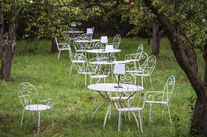 Row of Tables and Chairs at an Open-air Restaurant Stock Photo - Image ...