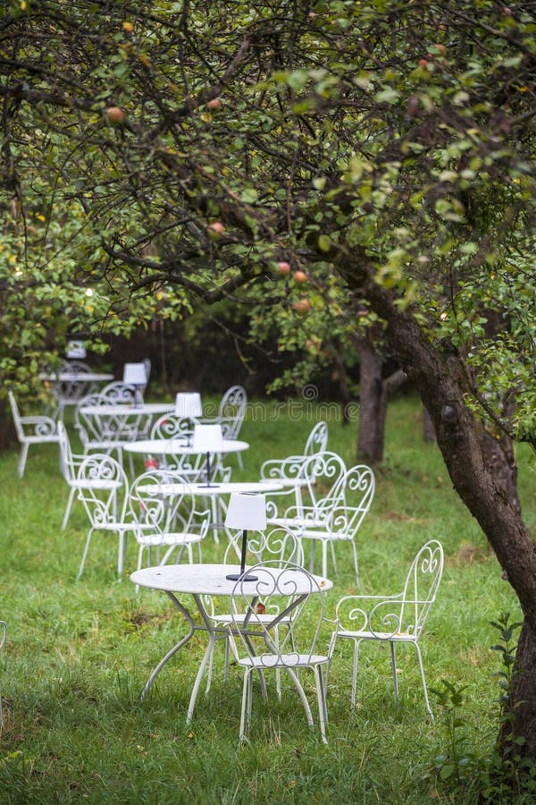 Row of Tables and Chairs at an Open-air Restaurant Stock Photo - Image ...