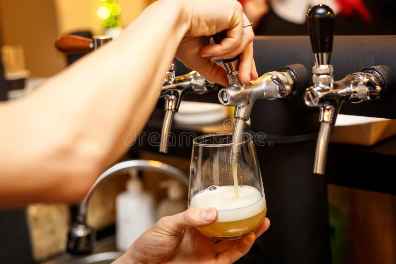 Row of taps in a beer tap stock image. Image of alcohol - 209028857