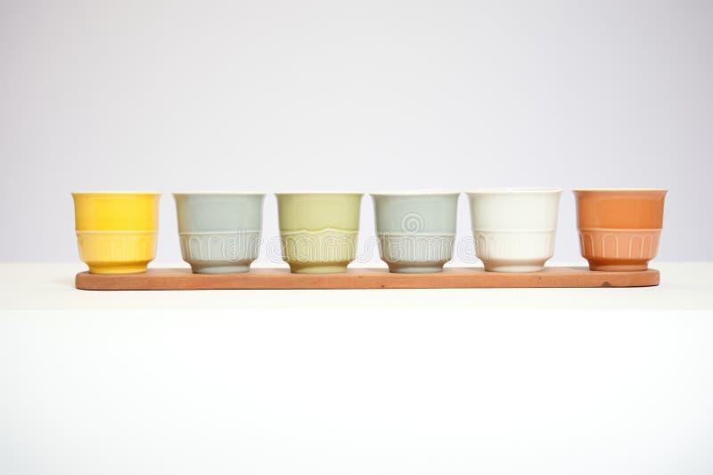 Row of Tea Cups with Different Tea Colors, Side View Stock Illustration ...