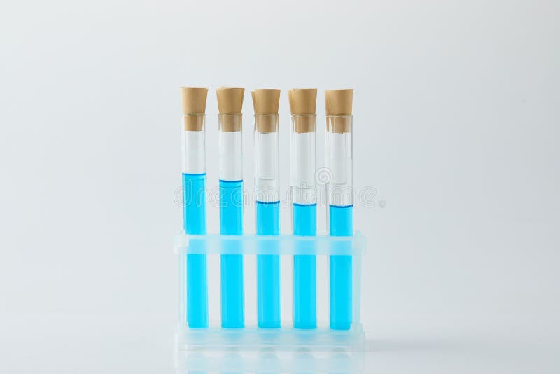 Row of Test Tubes Filled with Blue Liquid Stock Photo - Image of ...