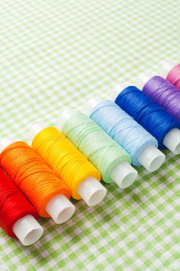 Row of Thread Spools in Rainbow Colors Stock Photo - Image of hobby ...