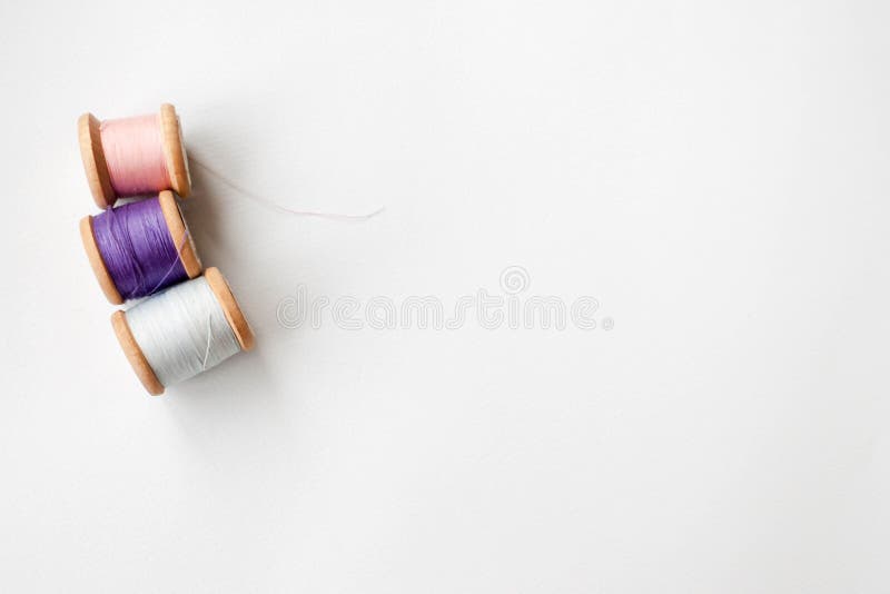 Row of Three of Different Colors Colorful Multicolored Wooden Sewing ...