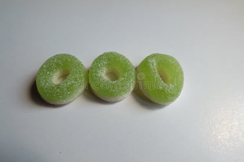 Row of 3 Green and White Sugar Coated Jelly Ring Candies Stock Photo ...