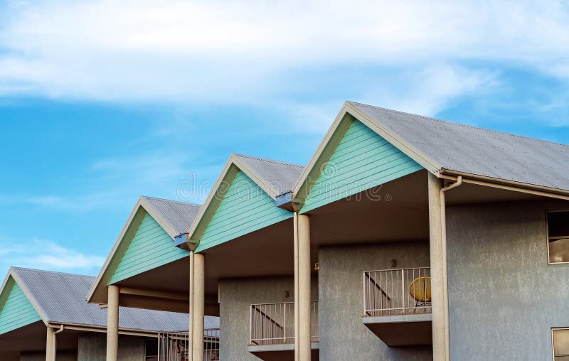 Row of Triangle Shaped Roofs Stock Photo - Image of construction ...