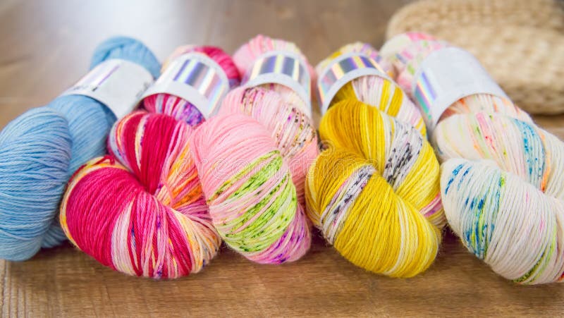 Row of Vibrant Variegated Yarn Skeins Stock Image - Image of beautiful ...