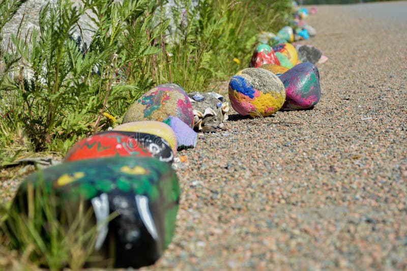 A path of colored stones stock photo. Image of leaf - 327408604