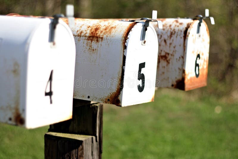 A row of white mailboxes stock photo. Image of package - 22697002