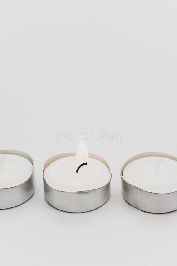 Burning Pure Soy Wax Scented Tea Lights on a White Background with ...