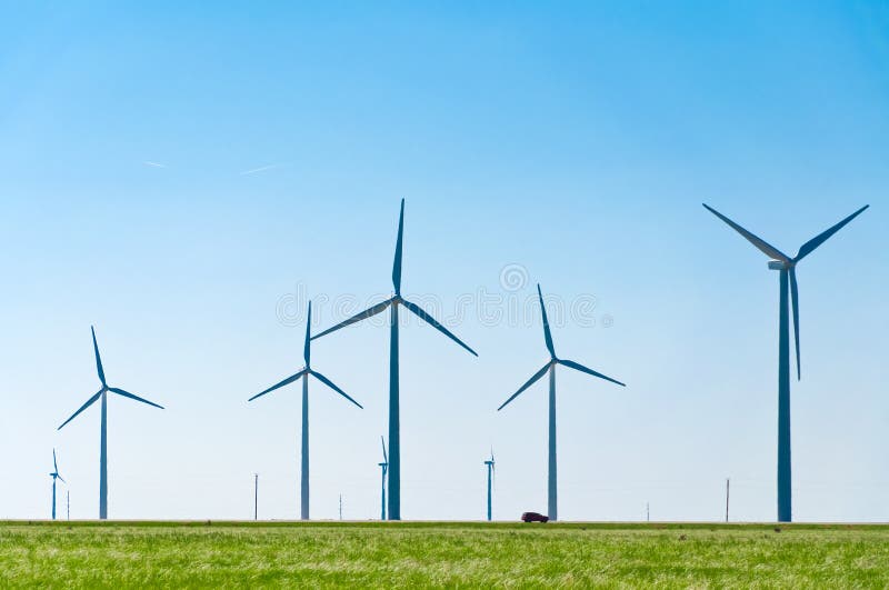 A Row of Windmills in the American Plains Stock Image - Image of ...