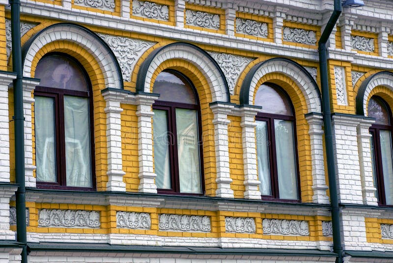 A Row of Windows on the Brick Facade of an Old House Stock Image ...