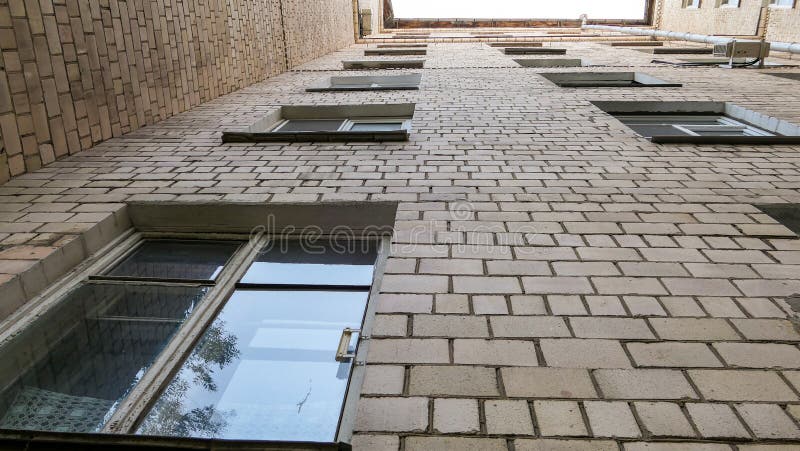 Row of Windows on Vertical Brick Wall of Residential Building in Moscow ...