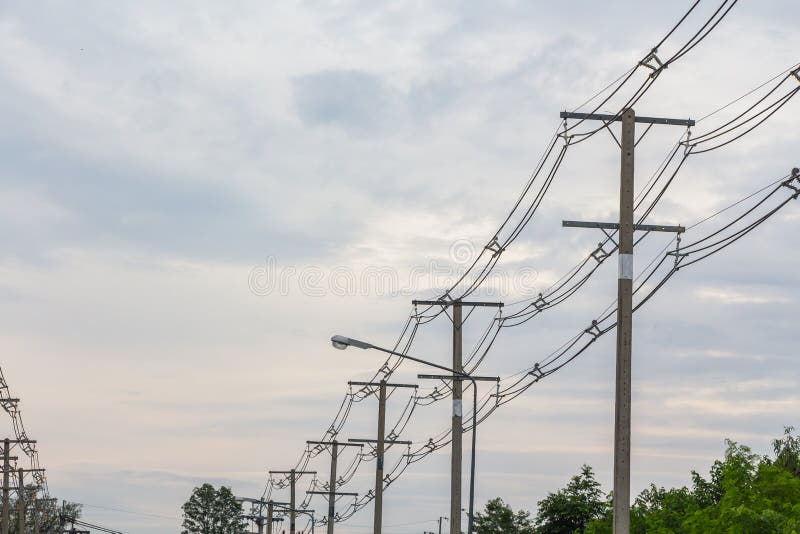 Row of wire electric pole stock photo. Image of network - 91899516
