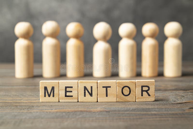 The Row of Wooden Cubes with Mentor Text and a Wooden Peg Doll Stock ...