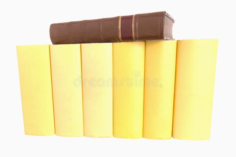 Row of Yellow Books with an Old Leather Bound Book Stock Photo - Image ...